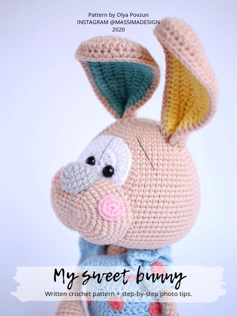 An Instructional Crochet Pattern for a Playful Pink Bunny with Colorful ...