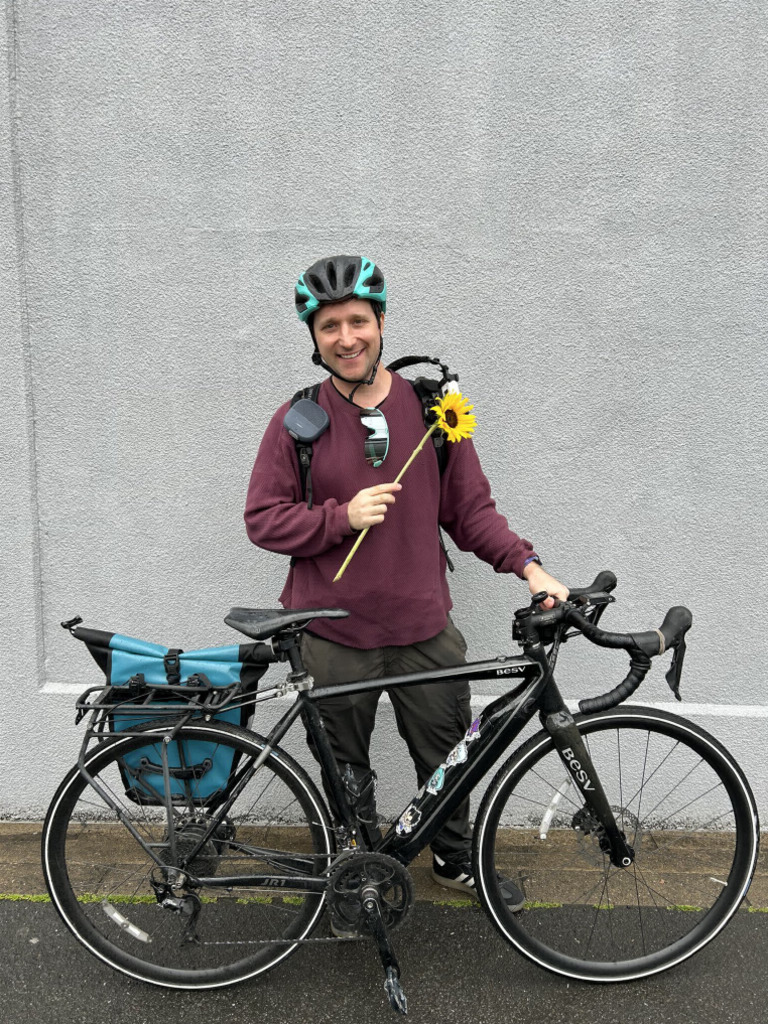 Robcdee Holding A Flower Alongside His Bike. | PDF